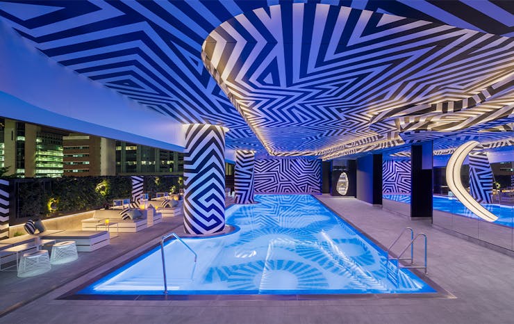 Dive Into This Rooftop Pool Cinema Complete With Floating Cocktail ...